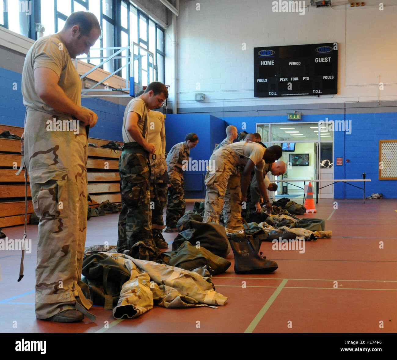 Team Mildenhall members dress in full personal protective equipment ...