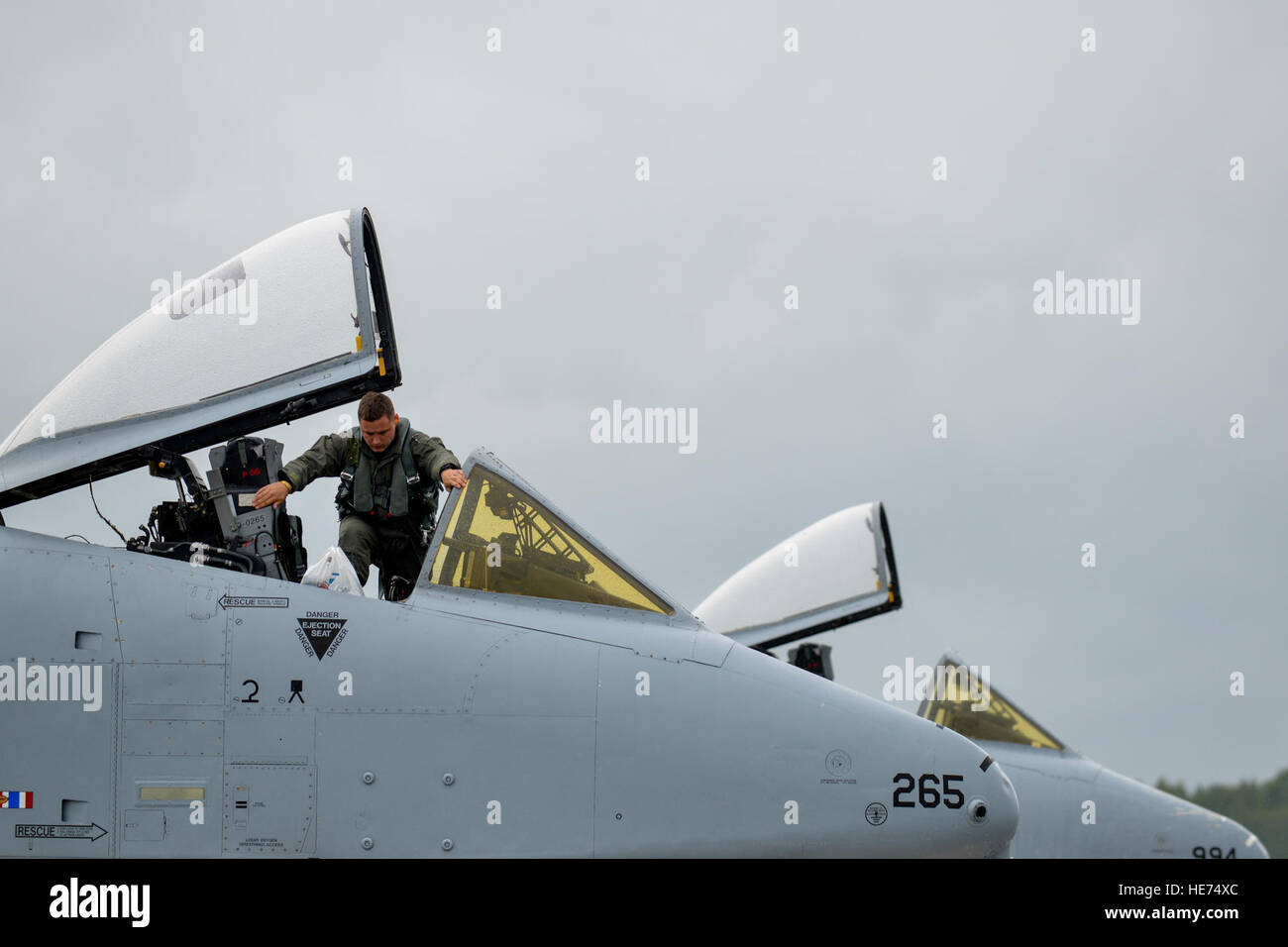 A-10C Thunderbolt II pilot from the 107th Fighter Squadron exits the ...