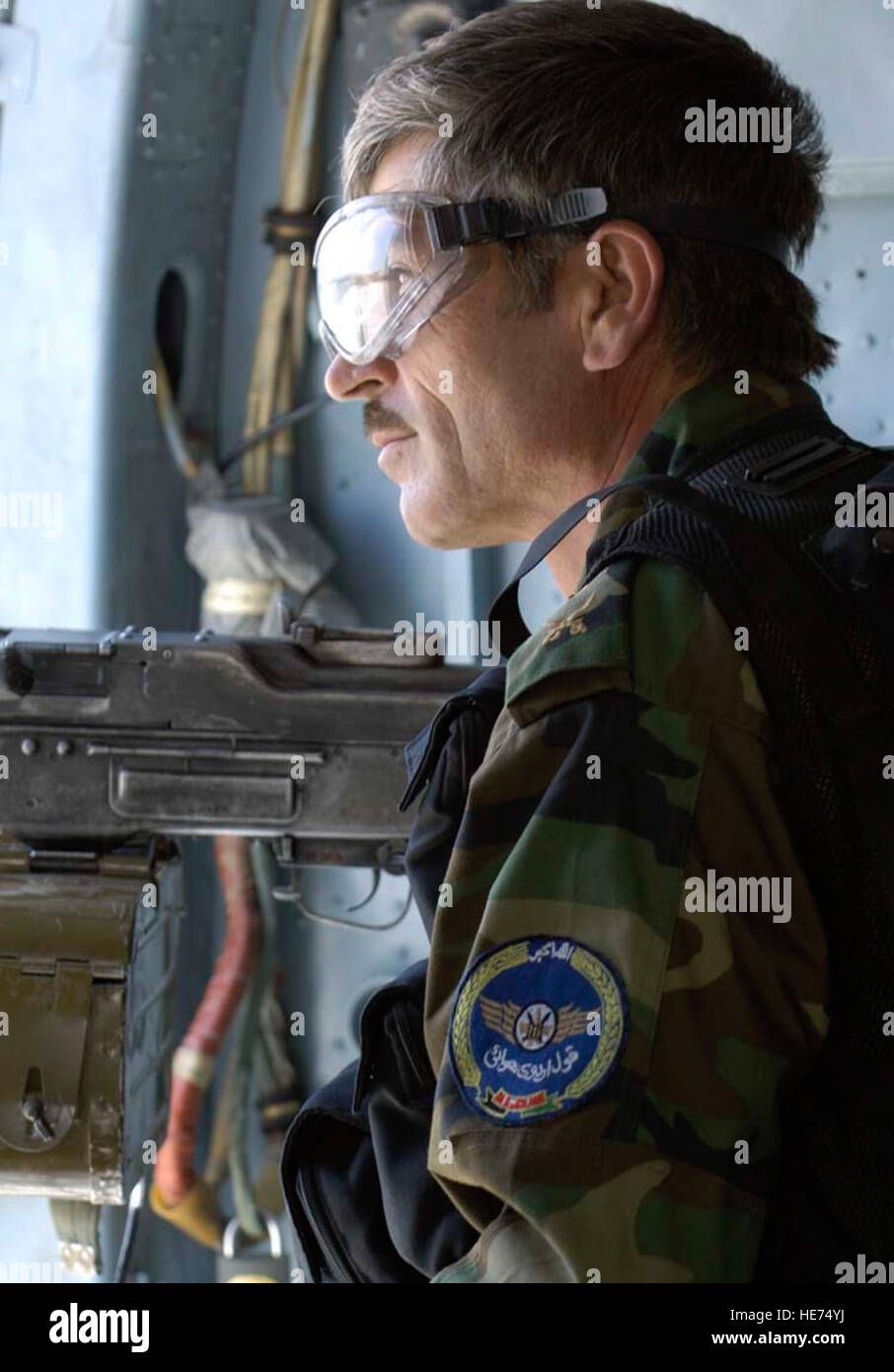 An MI-17 helicopter door gunner from the Afghan national army (ANA) air ...