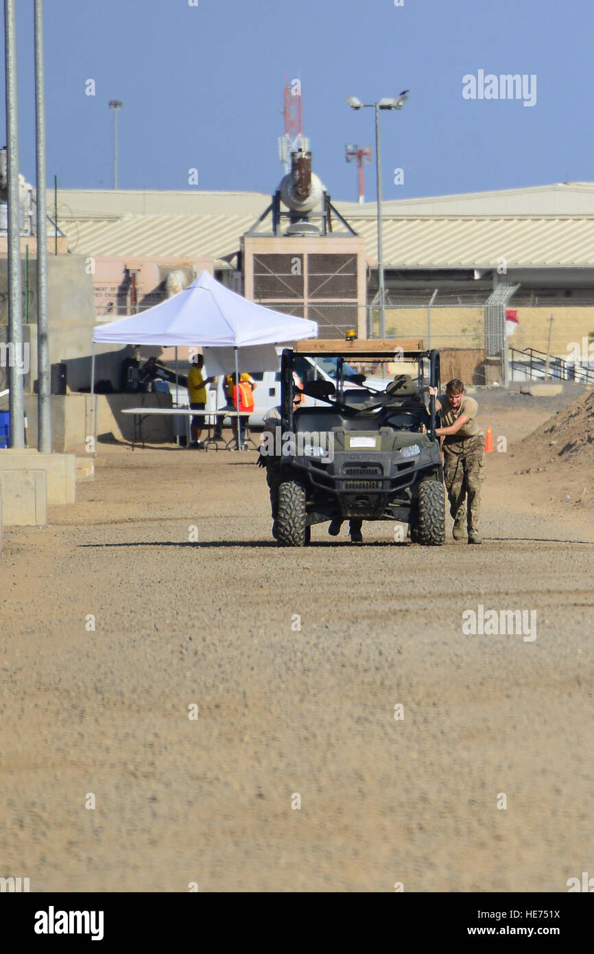 U.S. airmen with the 303rd Expeditionary Rescue Squadron begin a ...