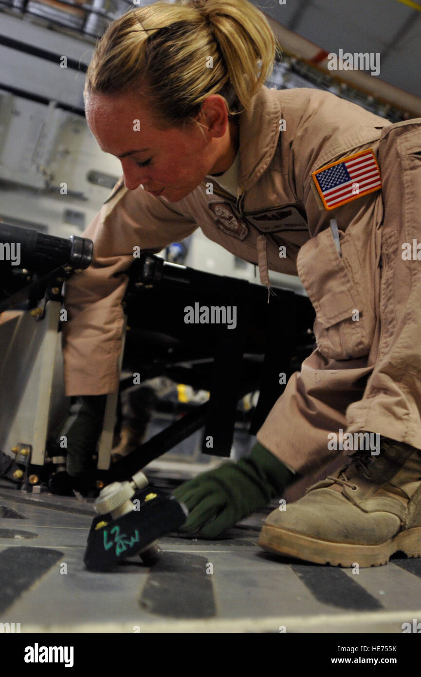 Tech. Sgt. Lindy Snodgrass, C-17 Globemaster III loadmaster, anchors ...