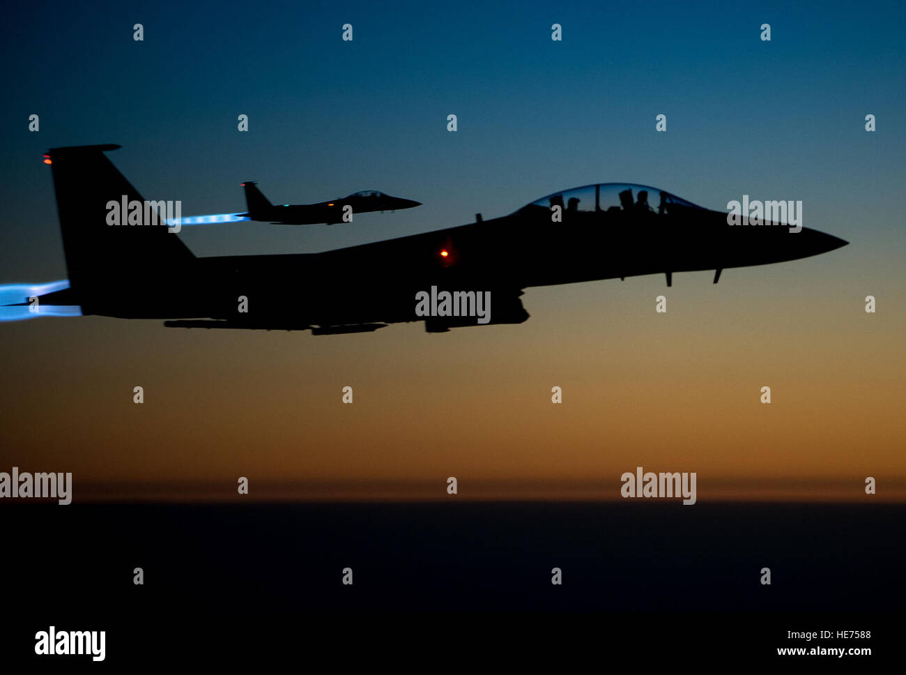 A pair of U.S. Air Force F-15E Strike Eagles fly over northern Iraq ...
