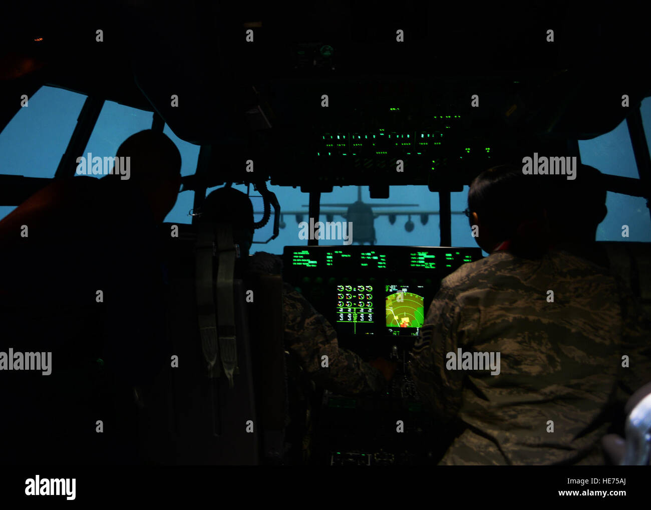 Air commandos watch as Lockheed Martin flight instructors maneuver ...