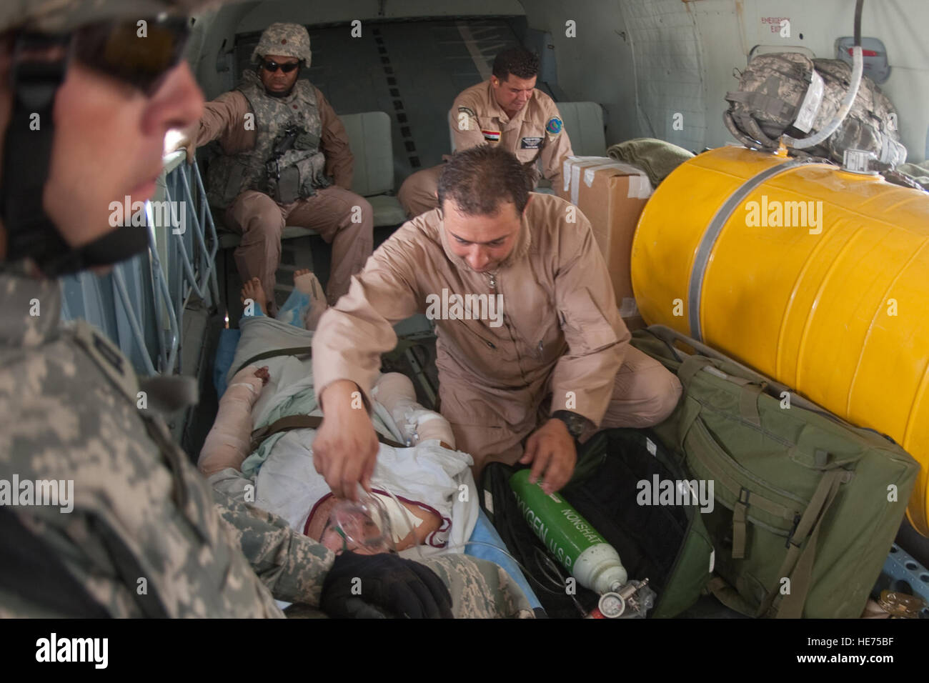Members of the Iraqi air force Medical team treat a trauma patient ...