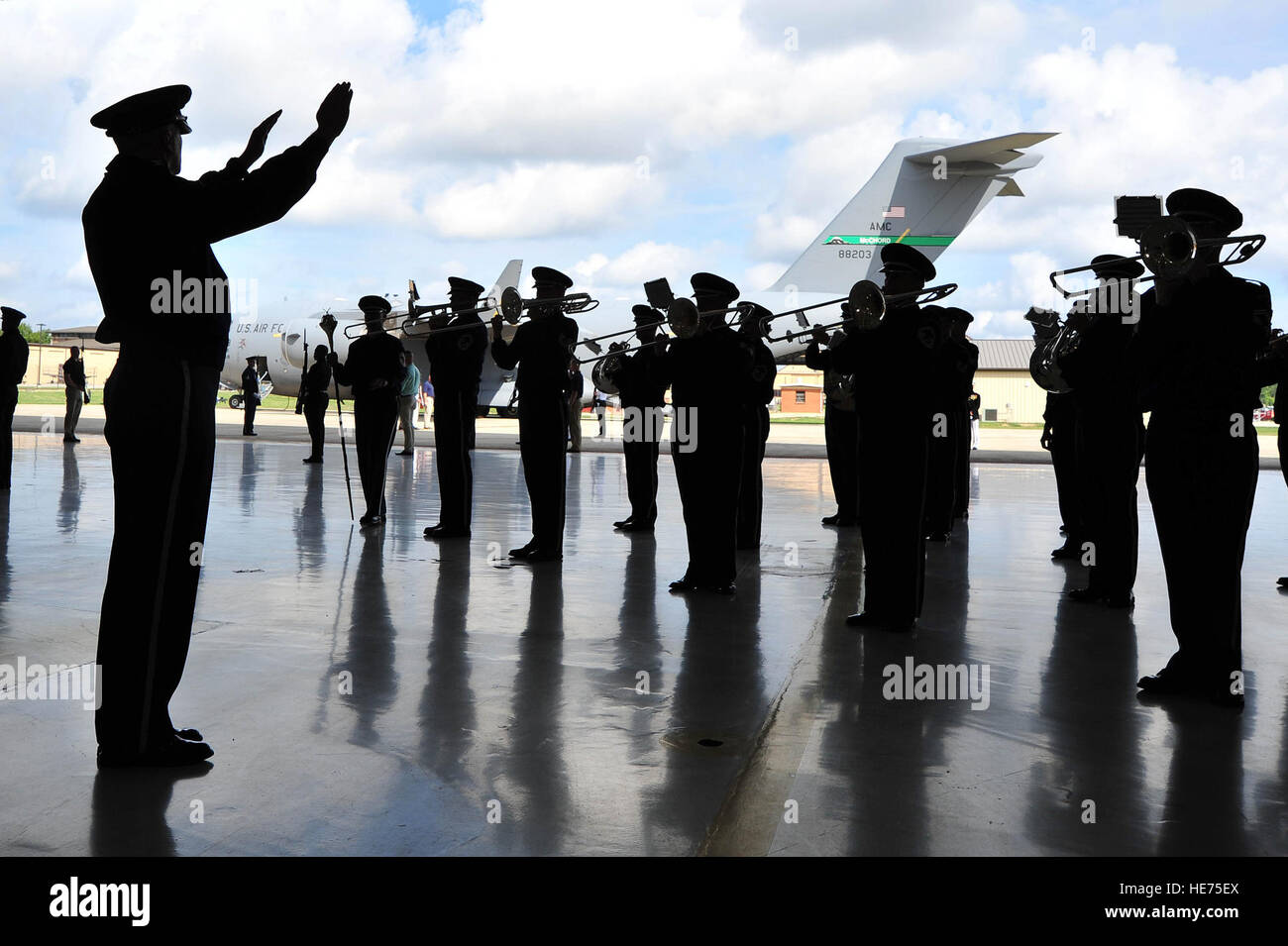 The United States Air Force Band Commander Col. Larry Lang conducts the ...