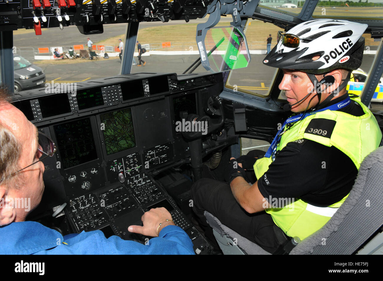 Lockheed Martin flight engineer demonstrates features of the C-130J ...