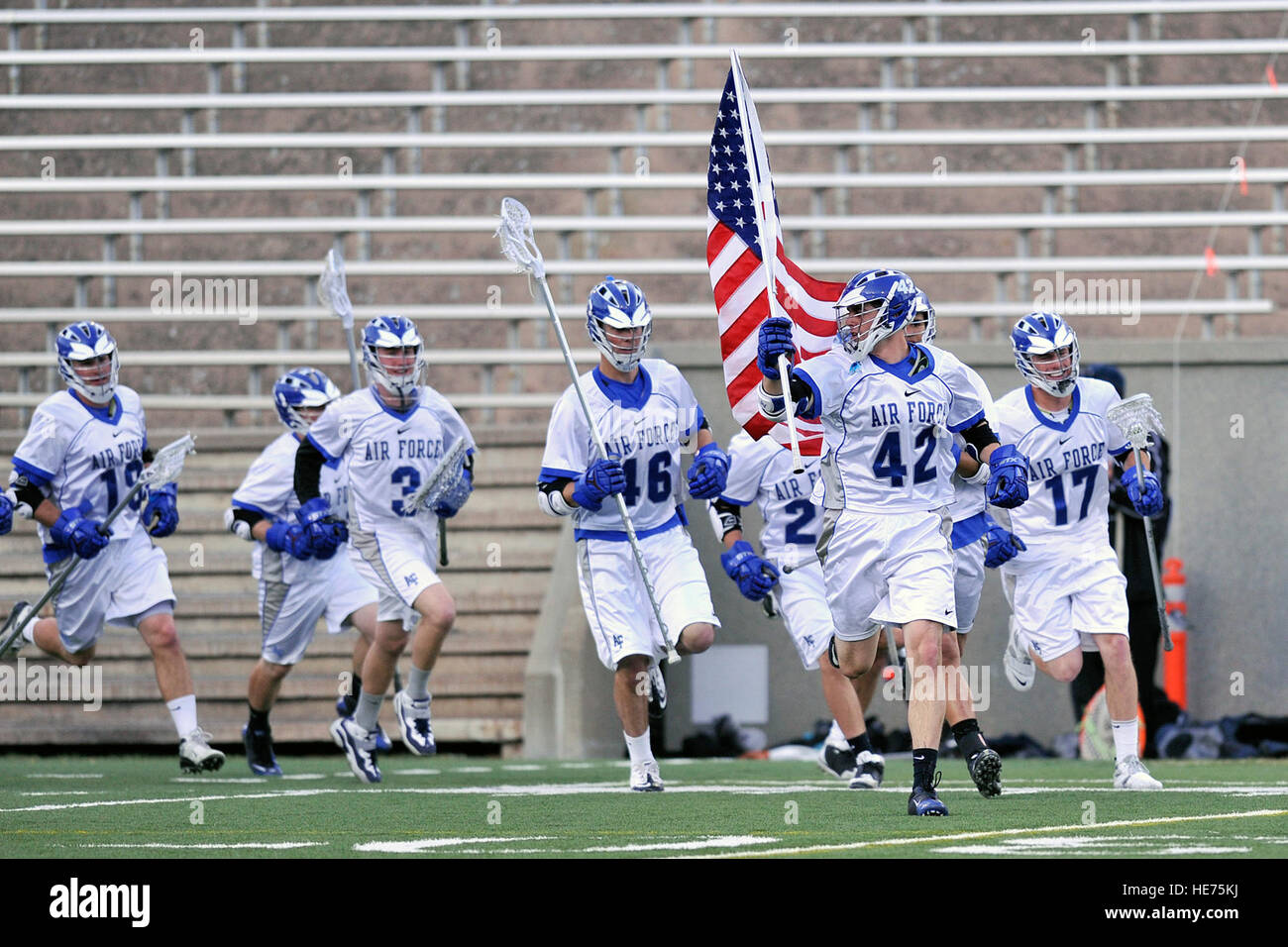 Falcons freshman Matt Puleo leads the Falcons onto the field as they ...