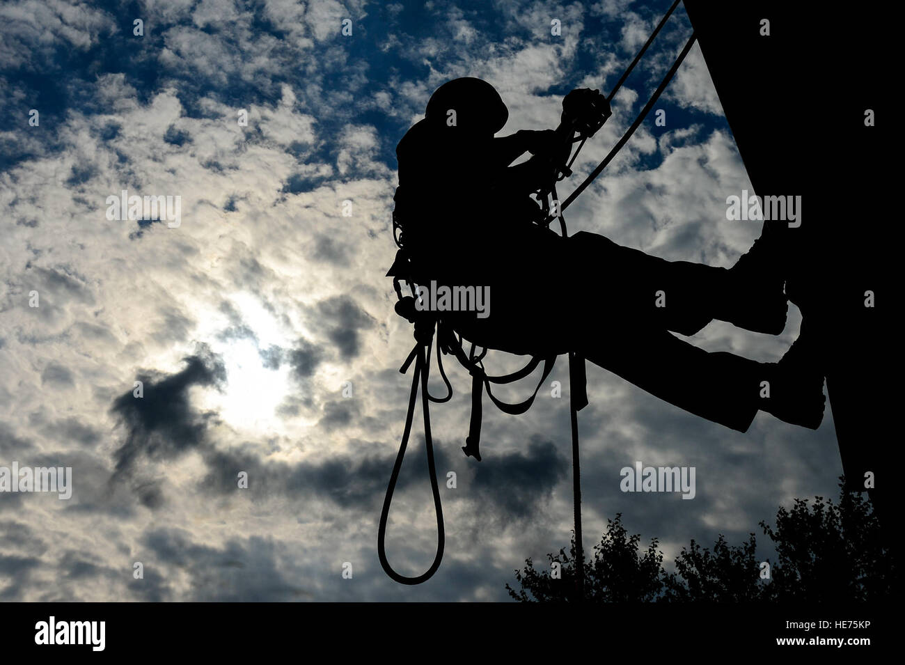 A U.S. Air Force firefighter participates in high angle rescue training ...