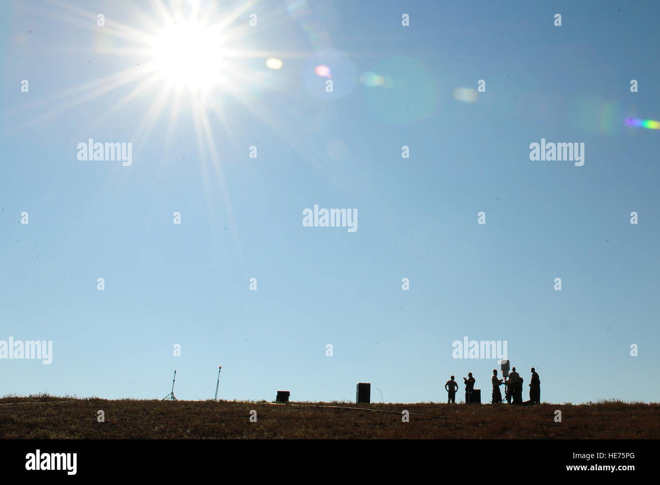 Members of the 12th Special Operations Squadron set up equipment for an ...