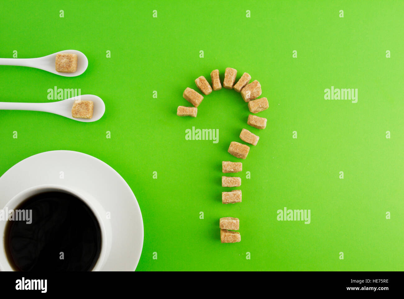 Diet, unhealthy sweet addiction concept. White cup of coffee or tea ...