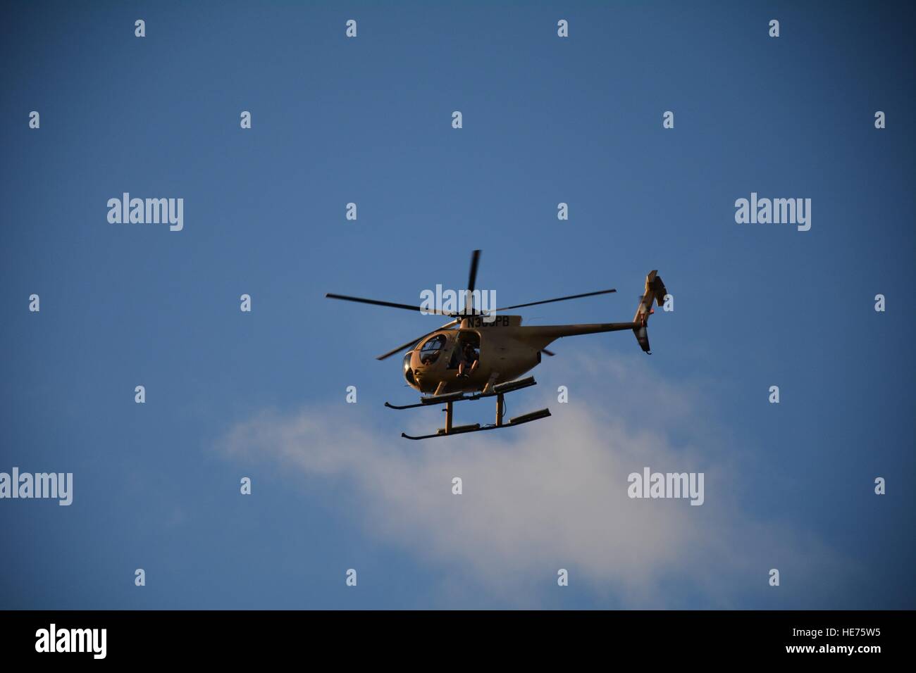 Helicopter flying in the sky Stock Photo - Alamy