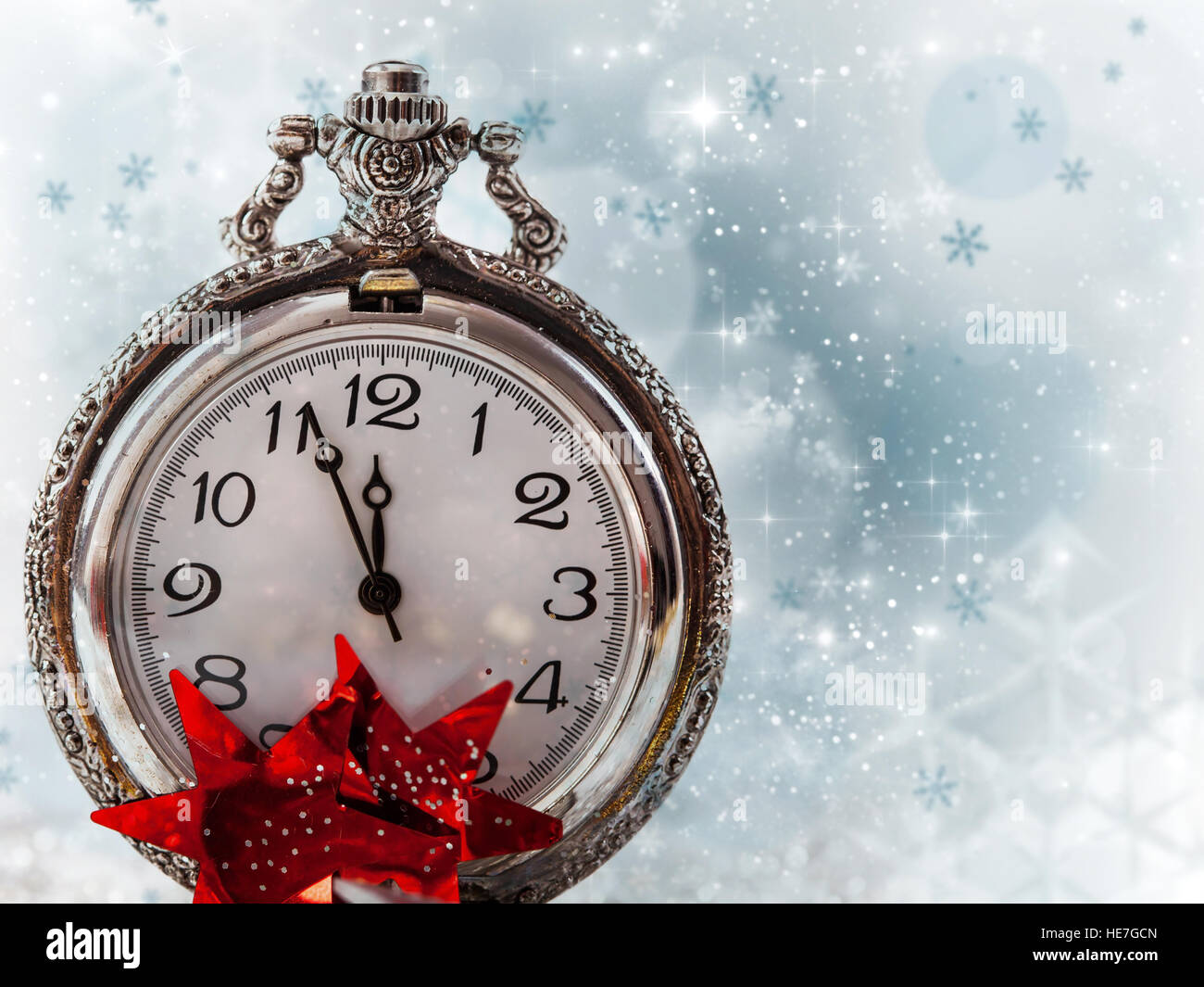 Background of holiday lights and clock close to midnight Stock Photo ...