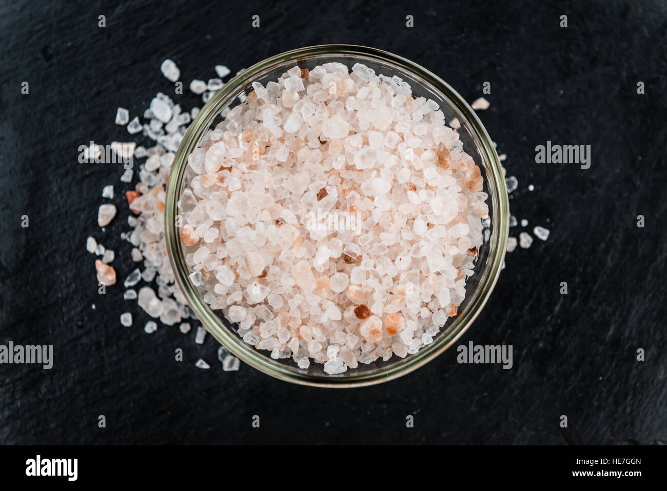 Portion of Himalayan Salt on a rustic slate slab (selective focus ...
