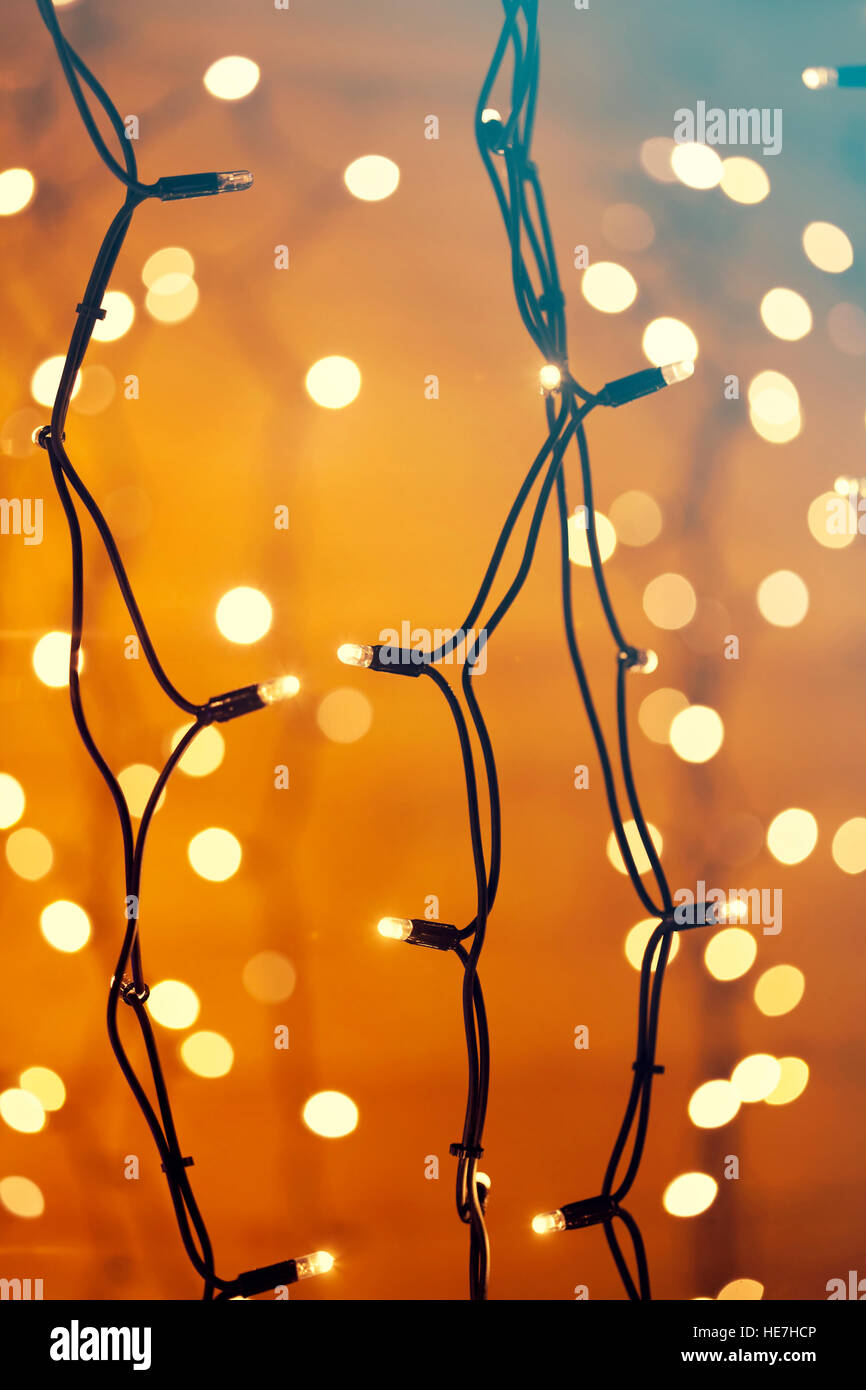 Colorful glowing Christmas lights. Holiday background Stock Photo - Alamy