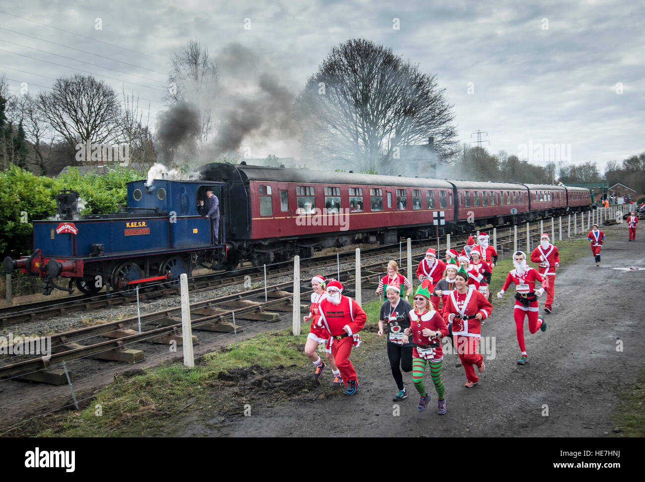 Runners during a Santa Dash in the Yorshshire town of Elsecar as they ...