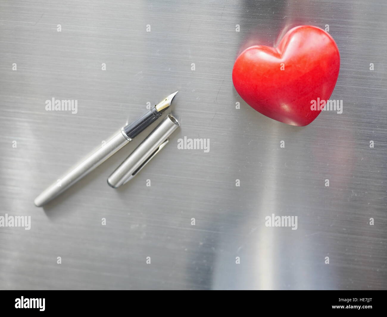 White heart writing love hi-res stock photography and images - Alamy