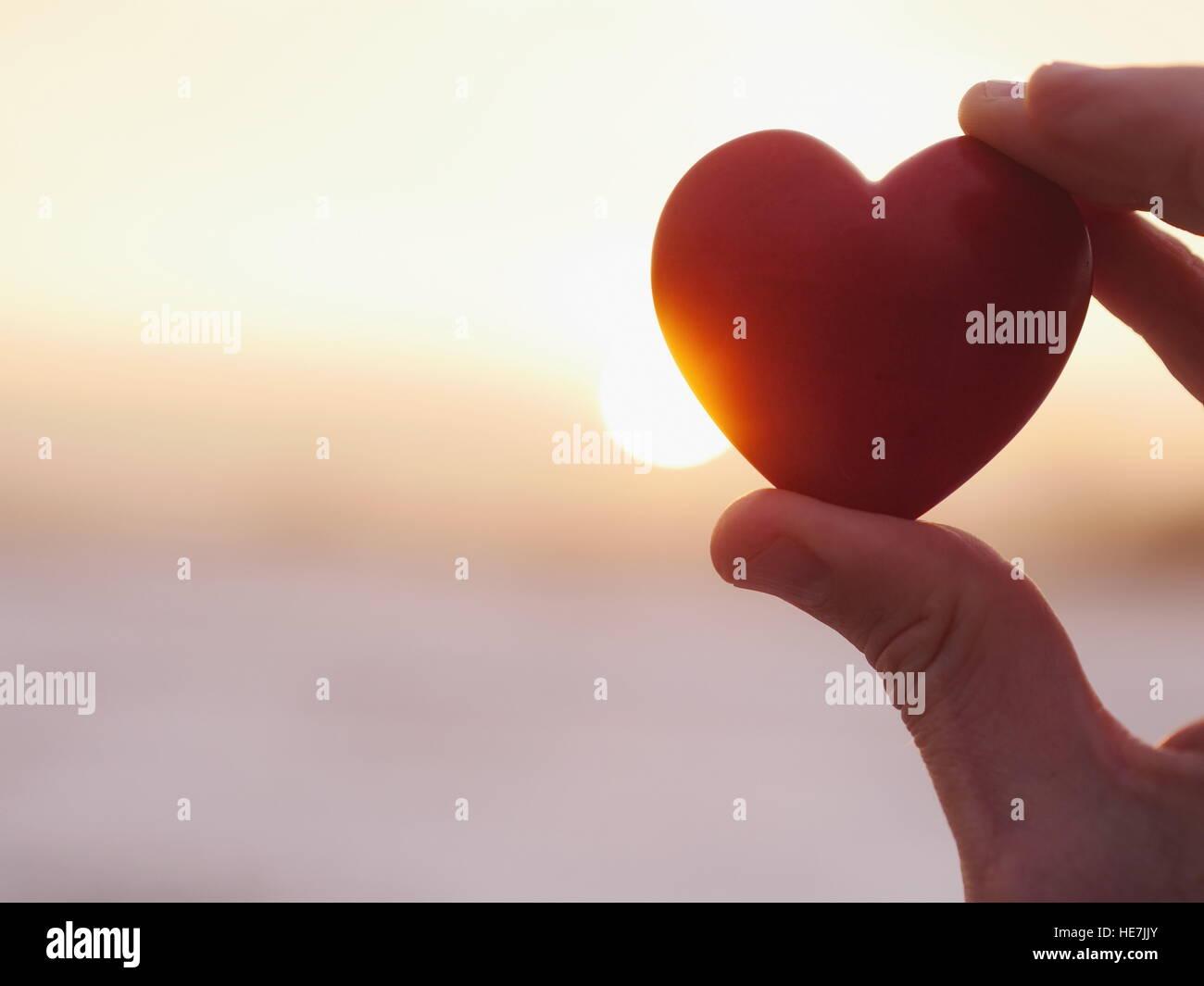 heart sunset love Stock Photo - Alamy