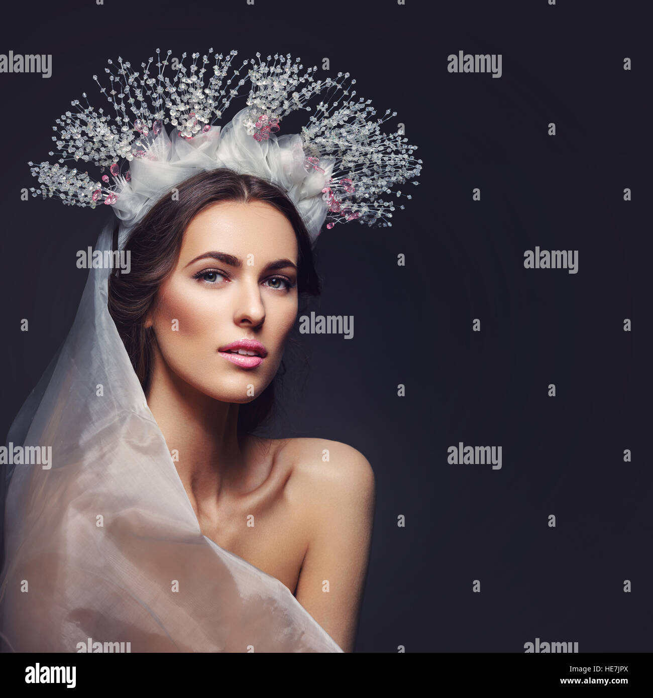 Beautiful girl in crystal crown and veil Stock Photo - Alamy