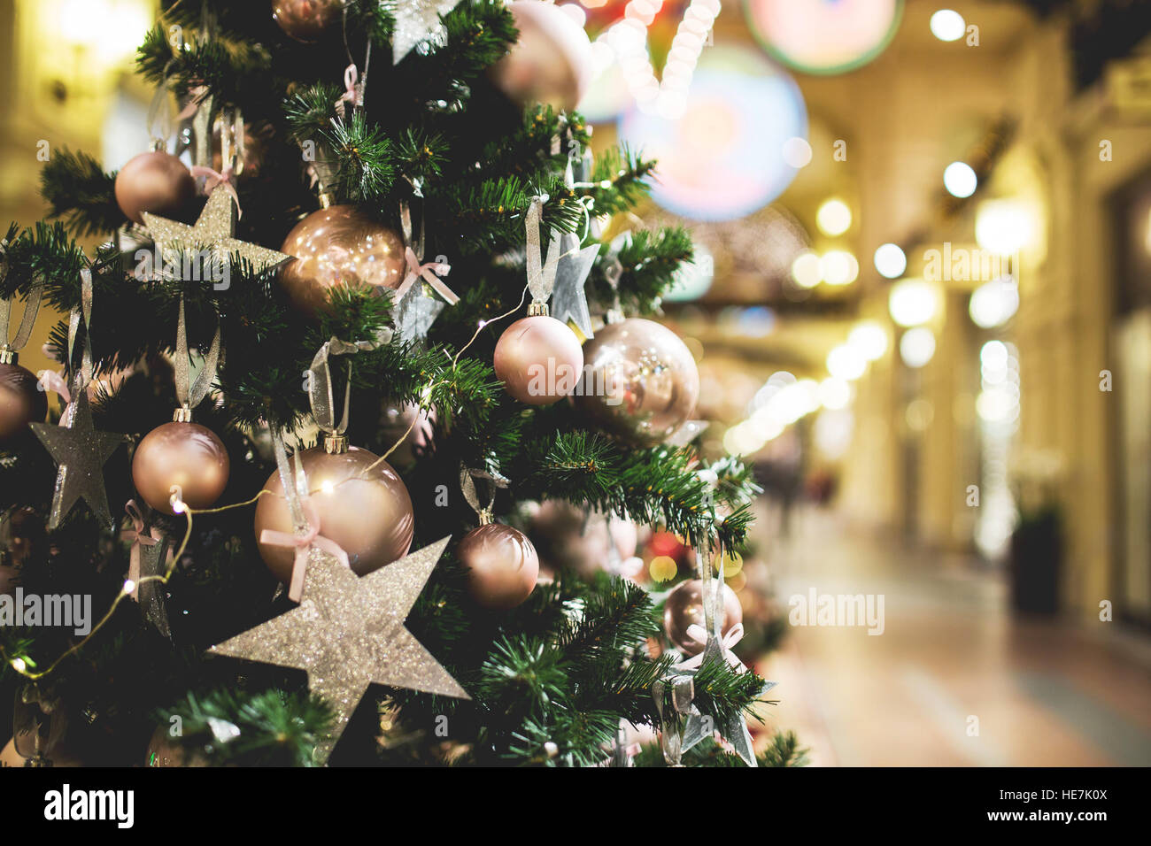 New Year tree stands in lobby of building trade, toned photo Stock ...