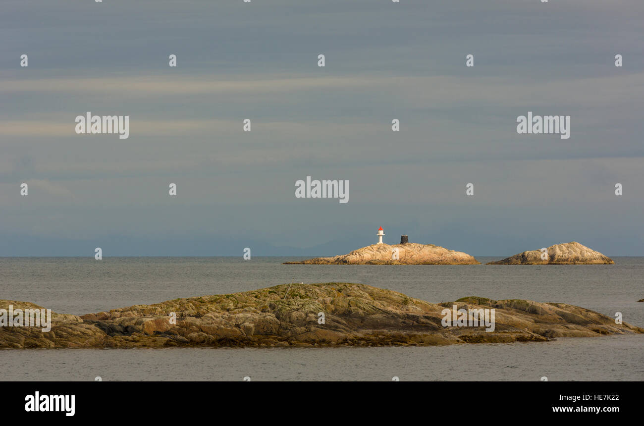 Lighthouse on a rocky islet, Lofoten islands, Henningsvaer, Norway ...