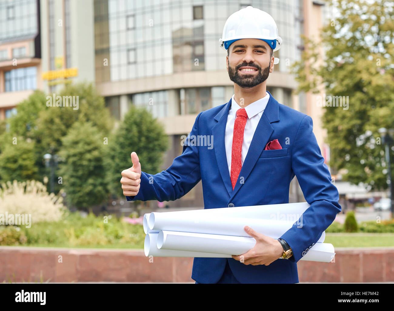 Designer and an architect. Horizontal shot of a Saudi engineer smiling ...