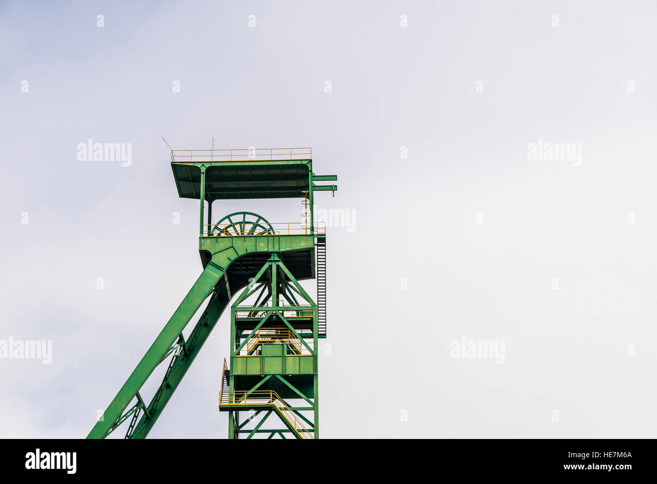Green tower of a well extraction of a mine of salt or potash in disuse ...
