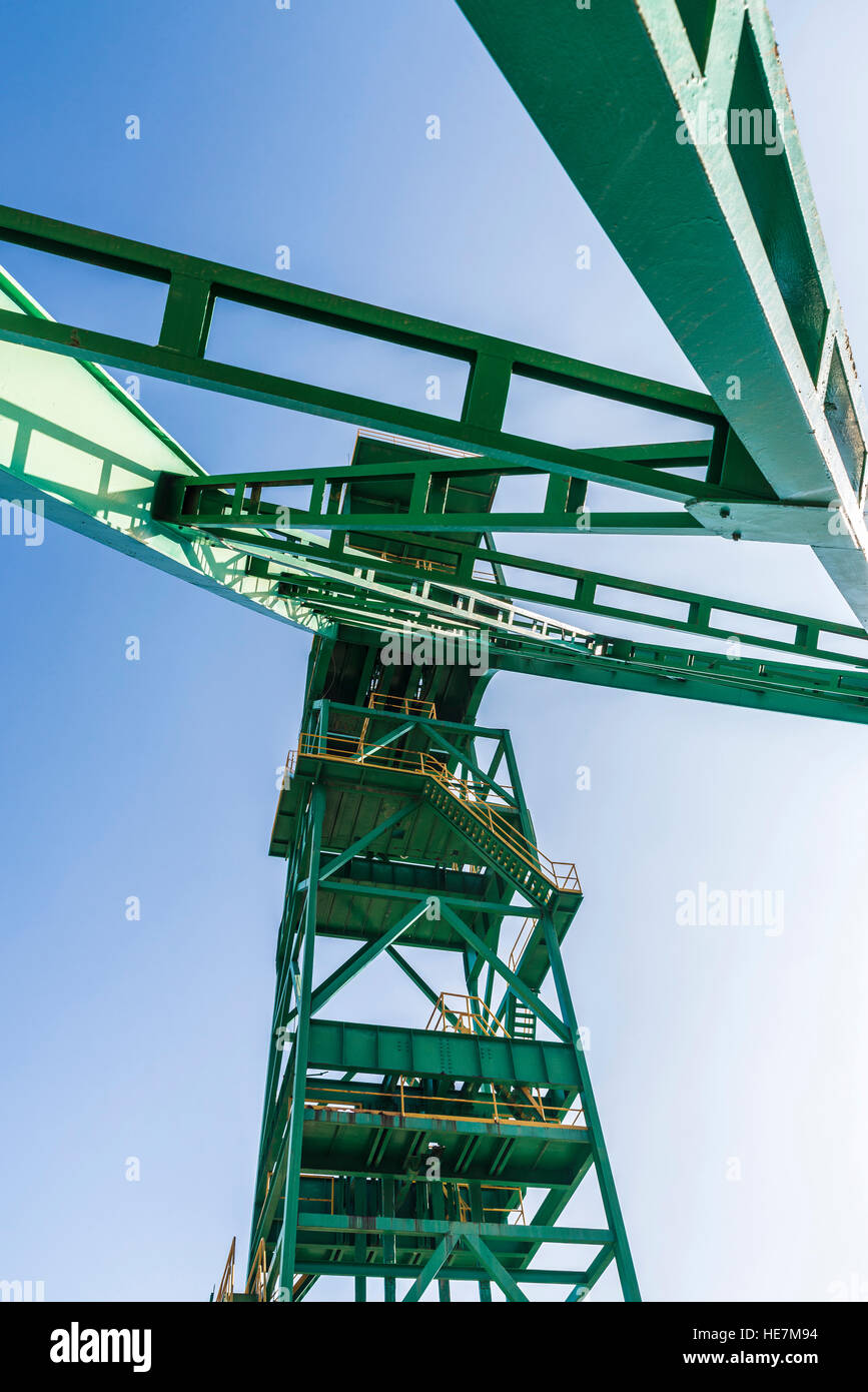 Green tower of a well extraction of a mine of salt or potash in disuse ...