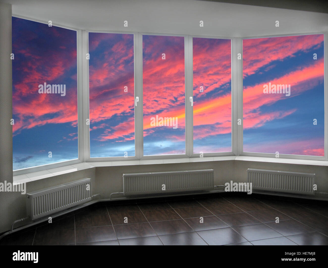 big office windows with beautiful crimson sunset beyond it Stock Photo ...