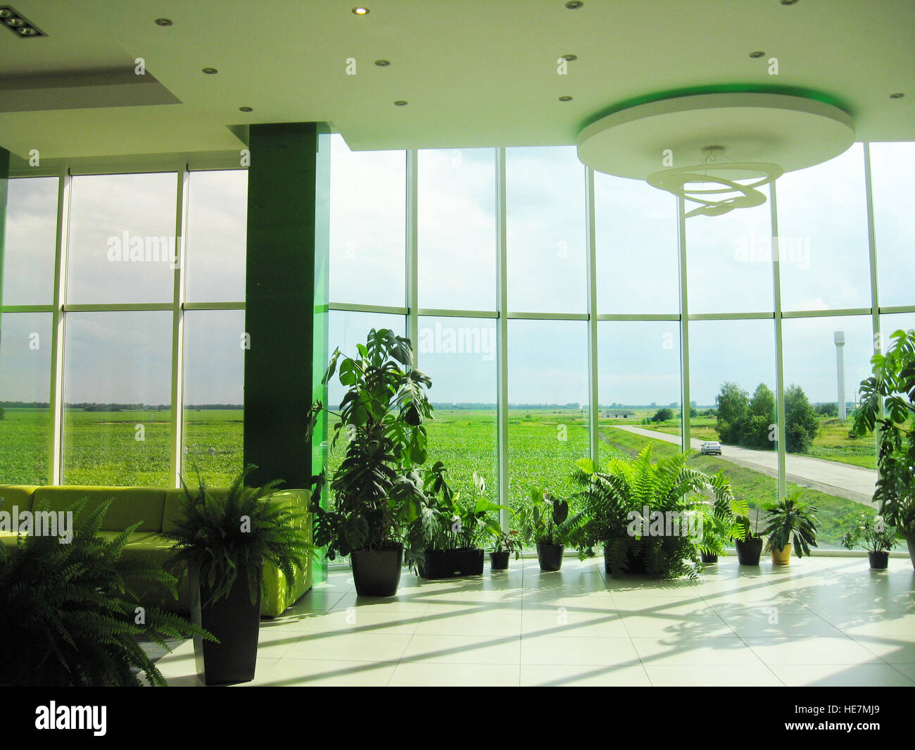 office window with a view of green agricultural field Stock Photo - Alamy