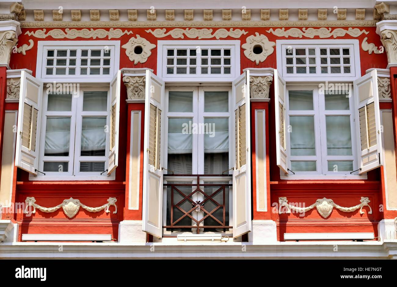 Singapore conservation house with white shutters Stock Photo - Alamy
