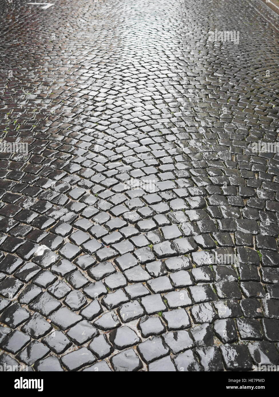 Wet cobble stone road hi-res stock photography and images - Alamy