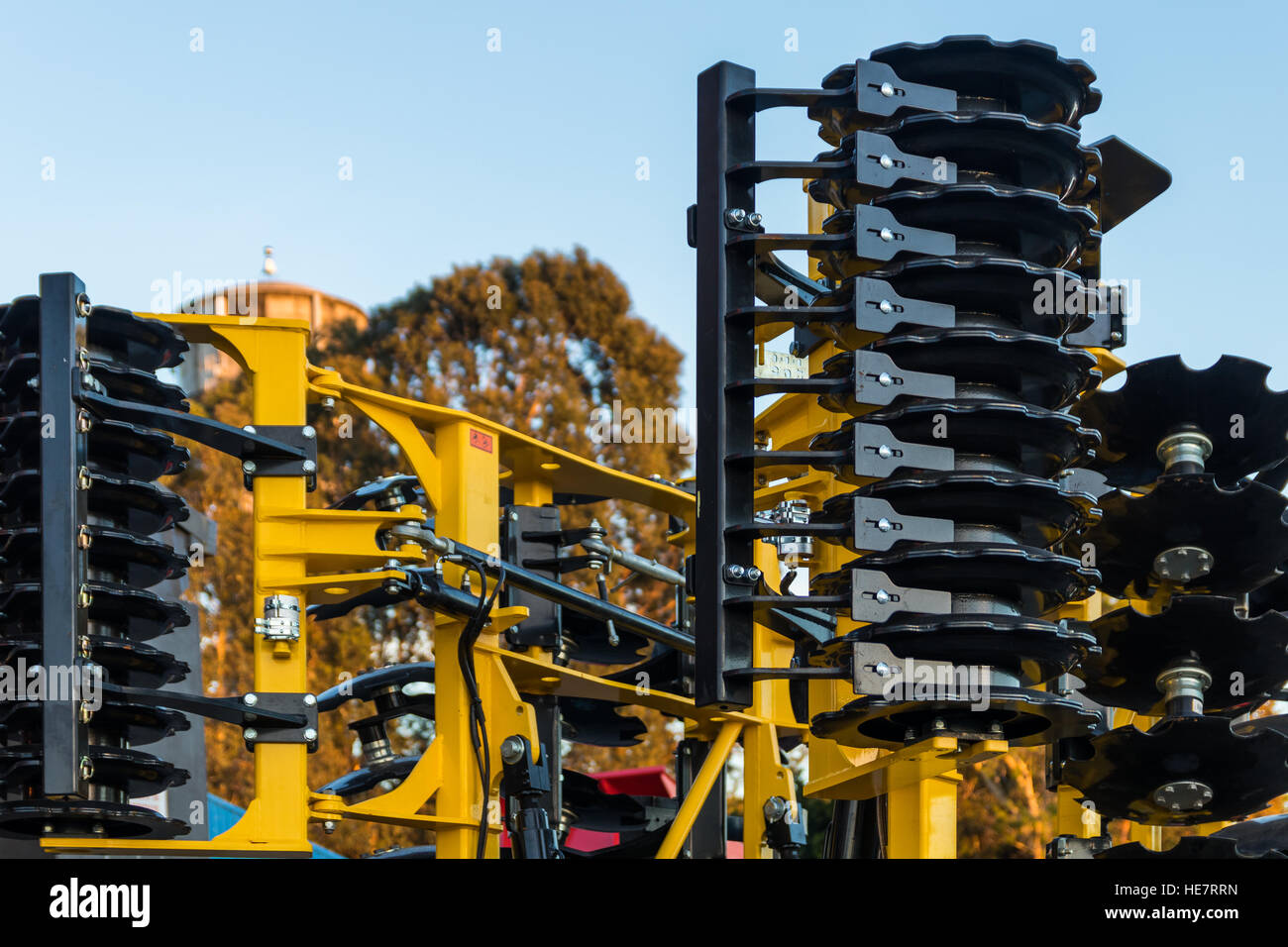 New multiple soil breaking farm machine Stock Photo - Alamy