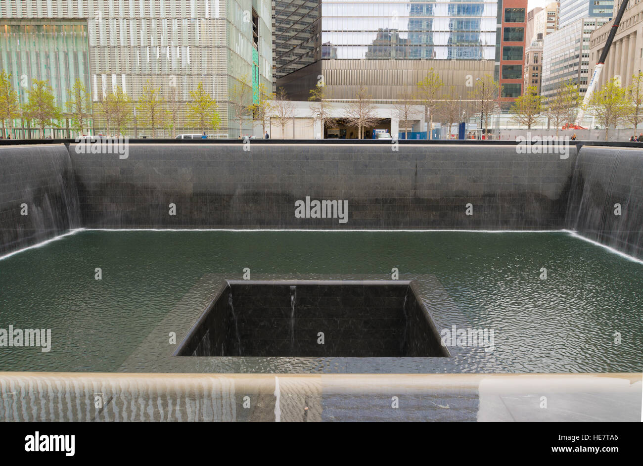 NEW YORK - APRIL 27, 2016: Ground zero memorial water basin in ...