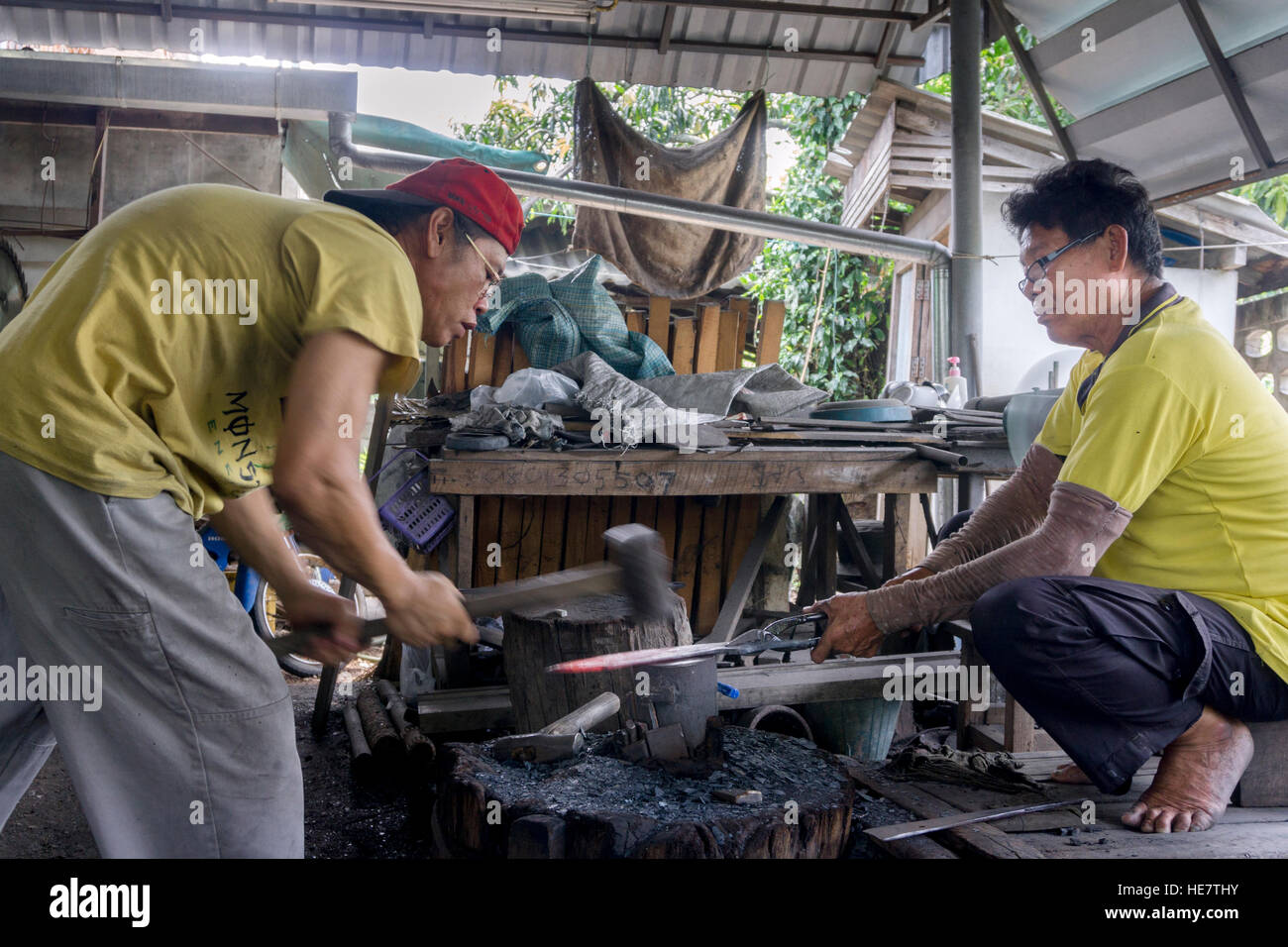Traditional sword makers - blacksmiths / bladesmiths making a ...