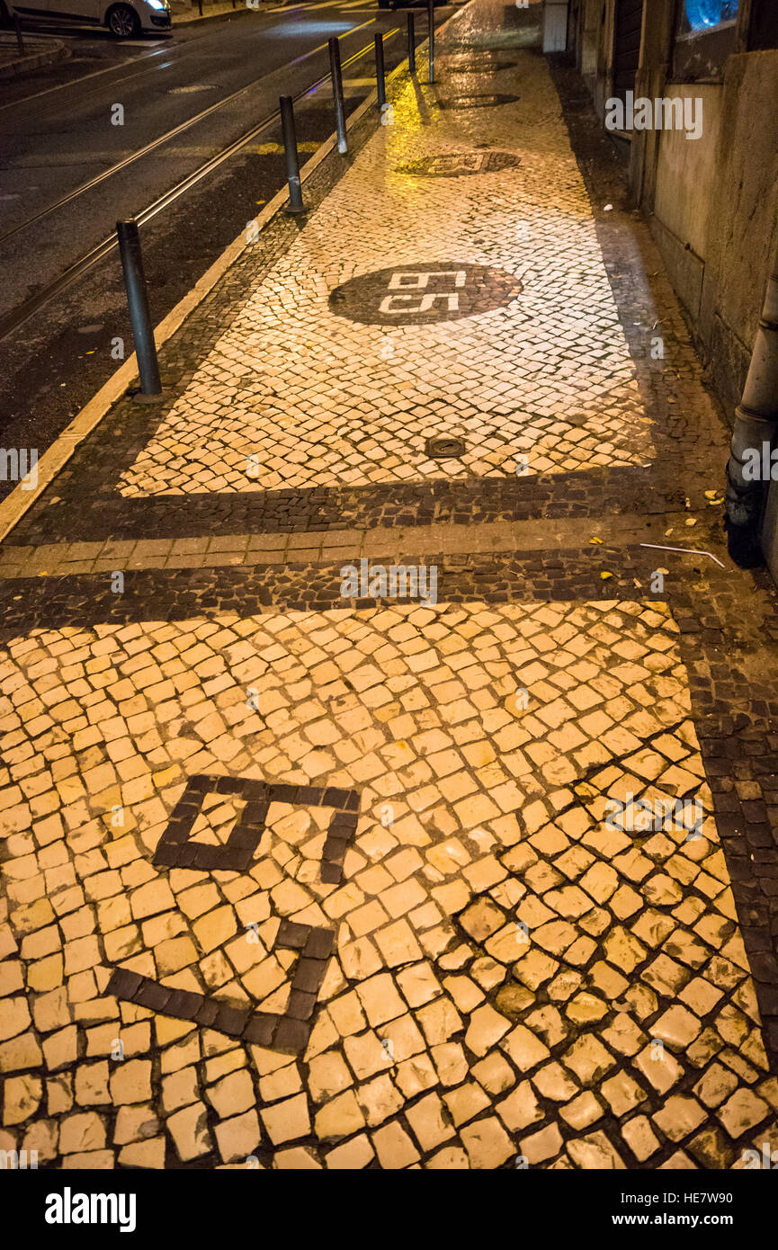 Marble sett pavement with street addresses spelt out, Calçada do Combro ...