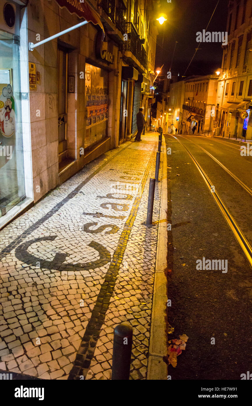 Marble sett pavement with name of shop "Estabelecimentos Cancela" spelt ...