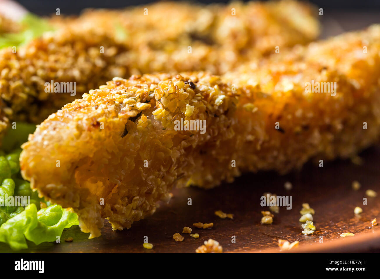 fish fry in corn breading close up Stock Photo - Alamy