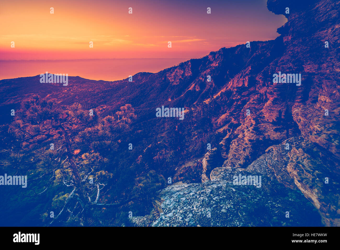 Mountain range at sunset Stock Photo - Alamy