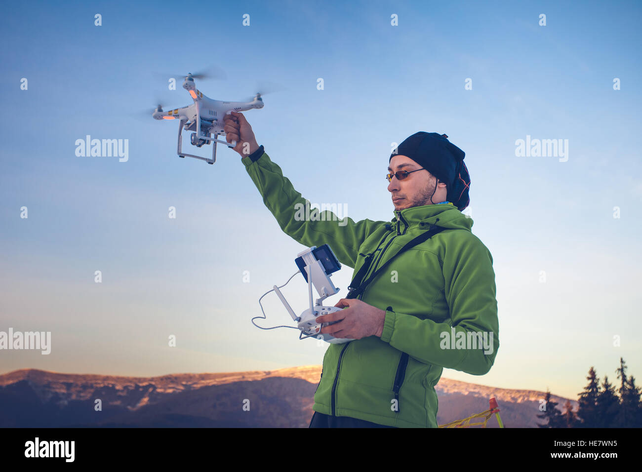 Man operating a drone Stock Photo - Alamy