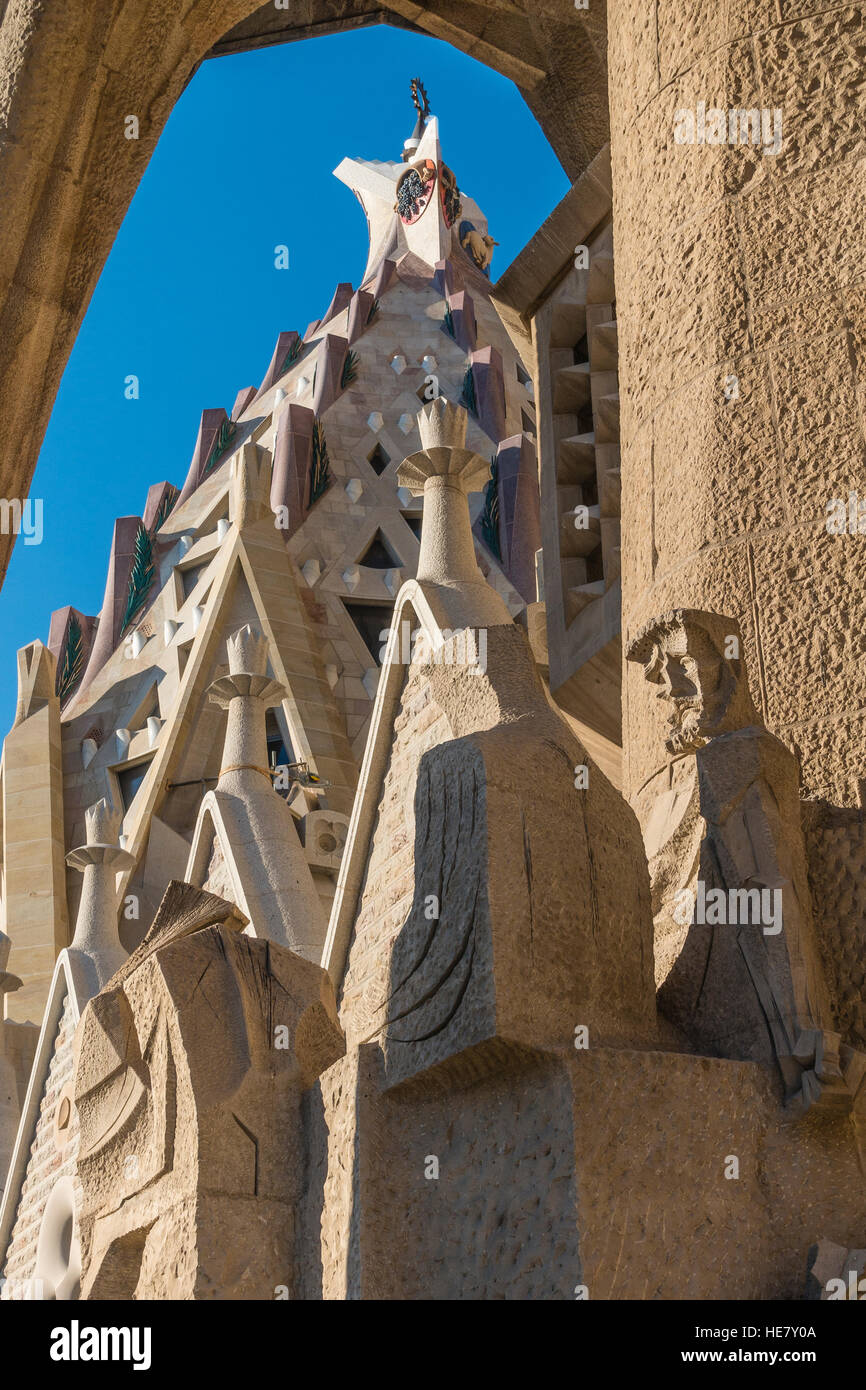 Sculpture of religious figures in stone on facade of the Sagrada ...