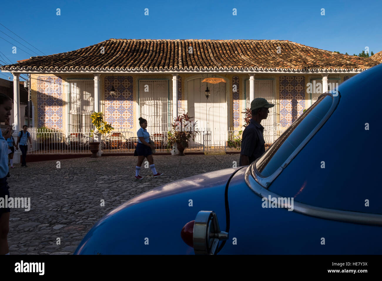Blue car, american classic 1950s Chevrolet, taxi, crossing junction in ...