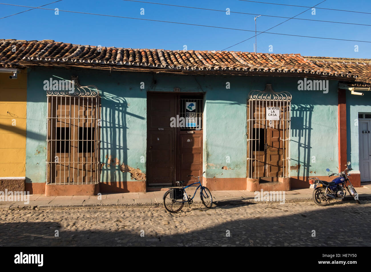 House for sale with traditional barred windows, Trinidad, Cuba Stock ...