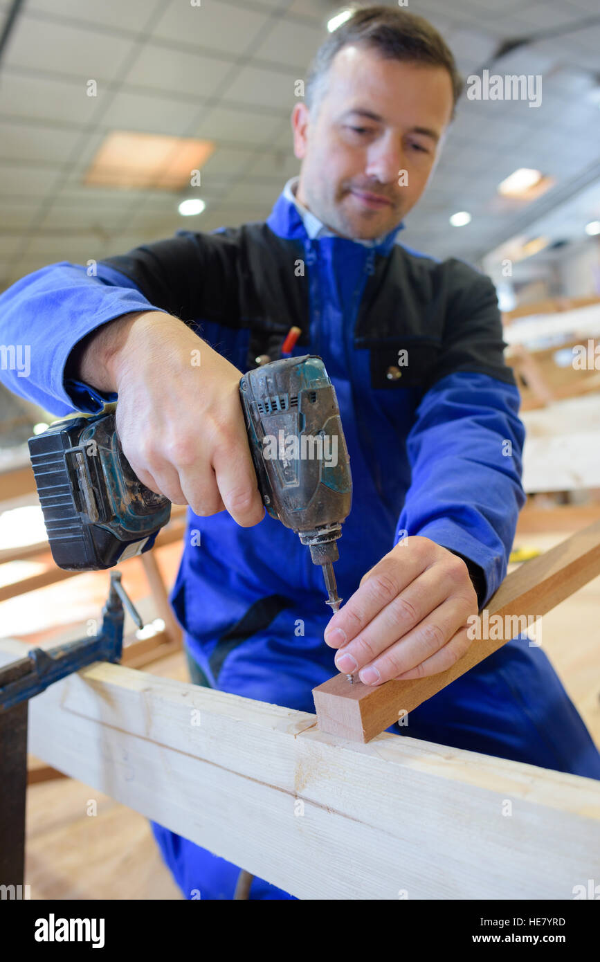 Man using cordless drill Stock Photo - Alamy