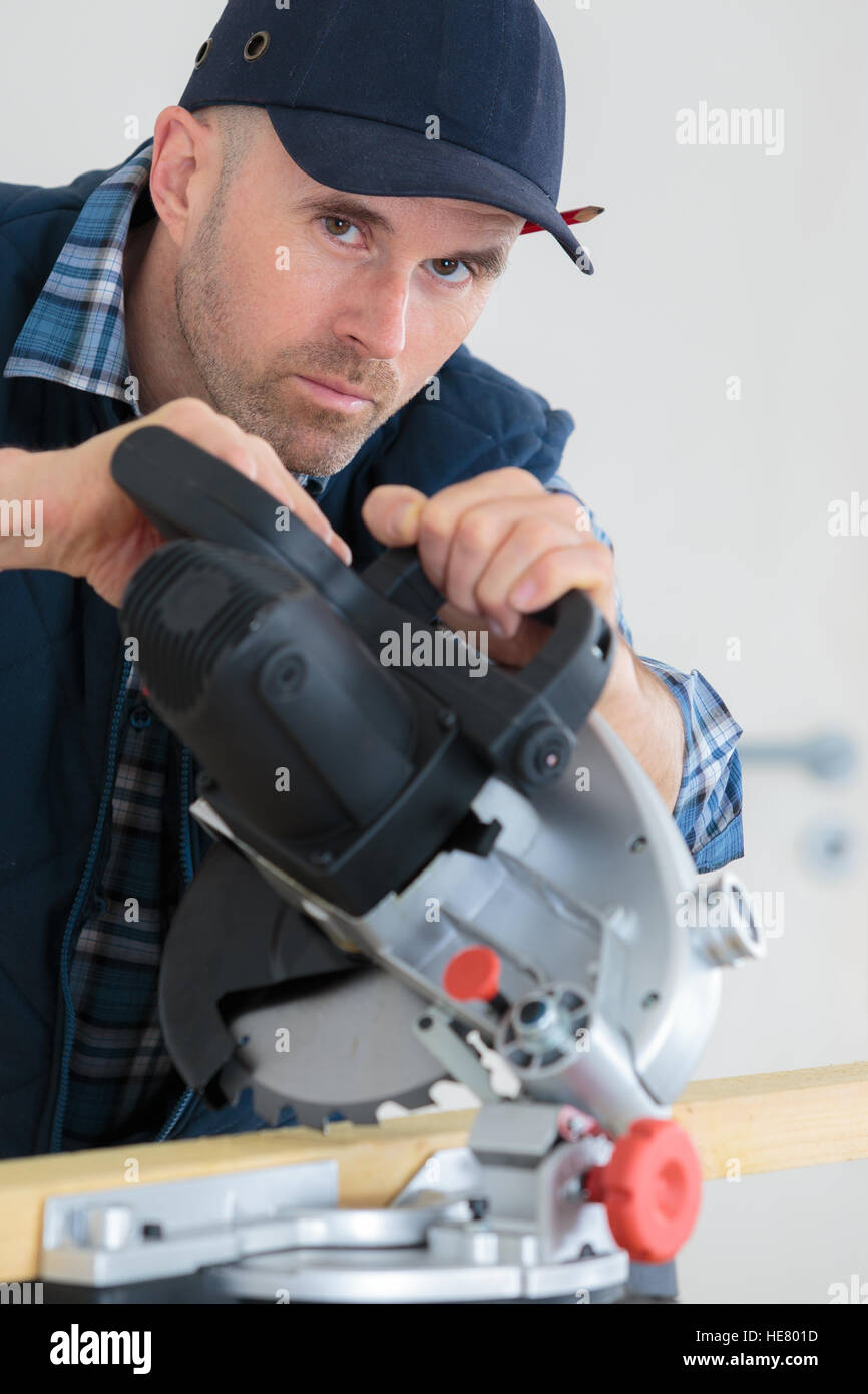 worker and drop saw Stock Photo - Alamy