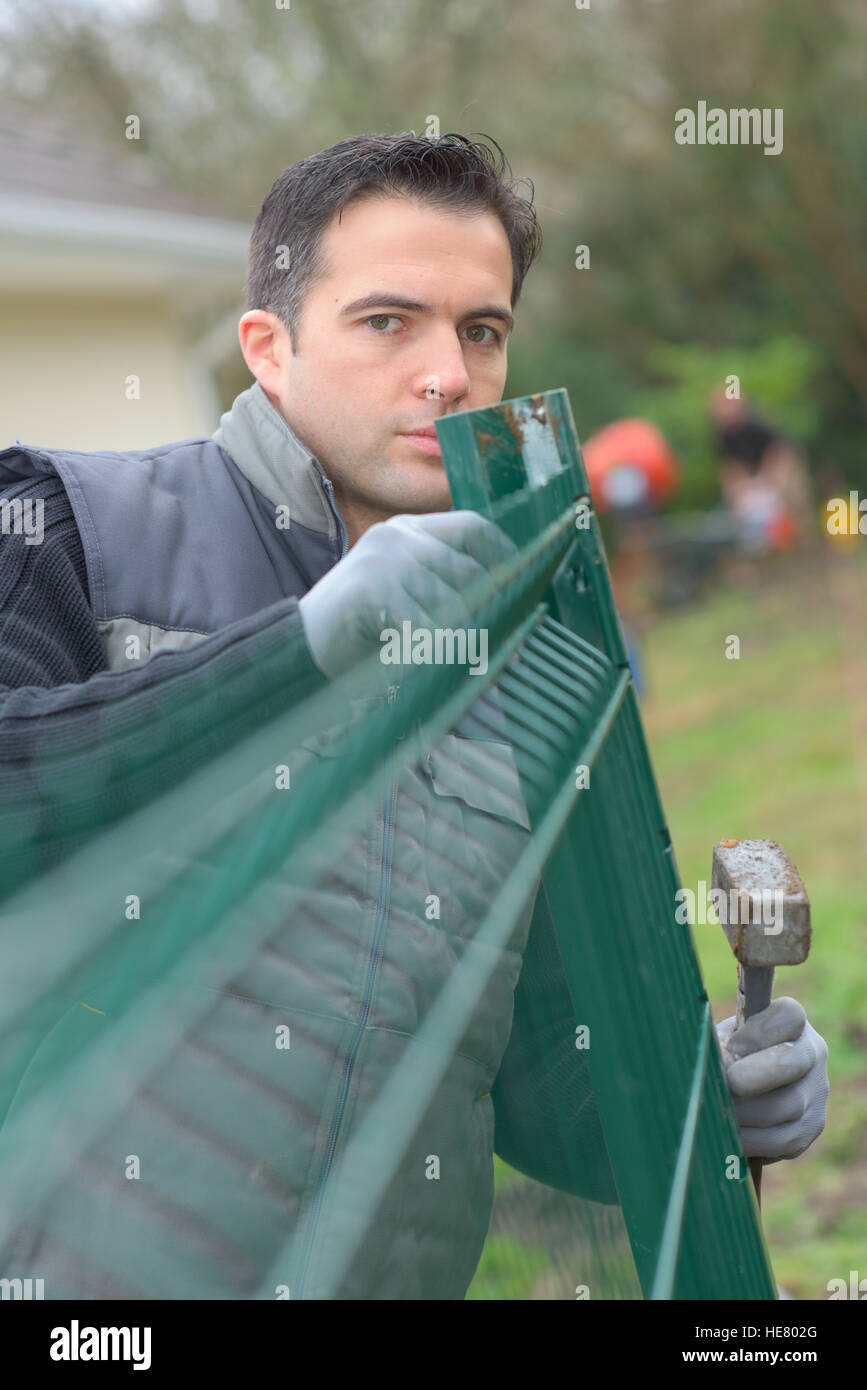 Repairing fence garden hi-res stock photography and images - Alamy