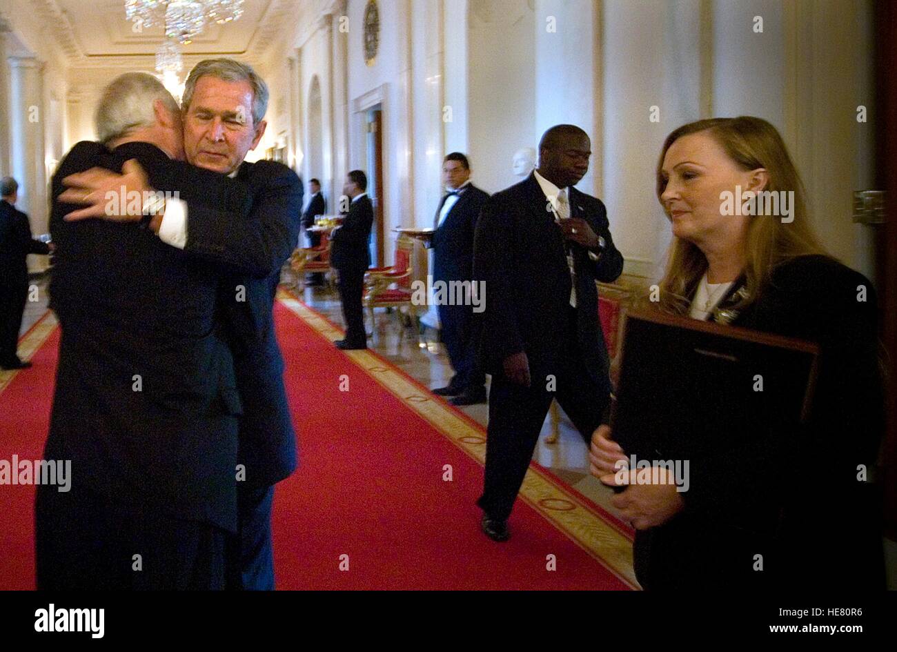 U.S. President George W. Bush hugs Daniel Murphy, father of Navy SEAL ...