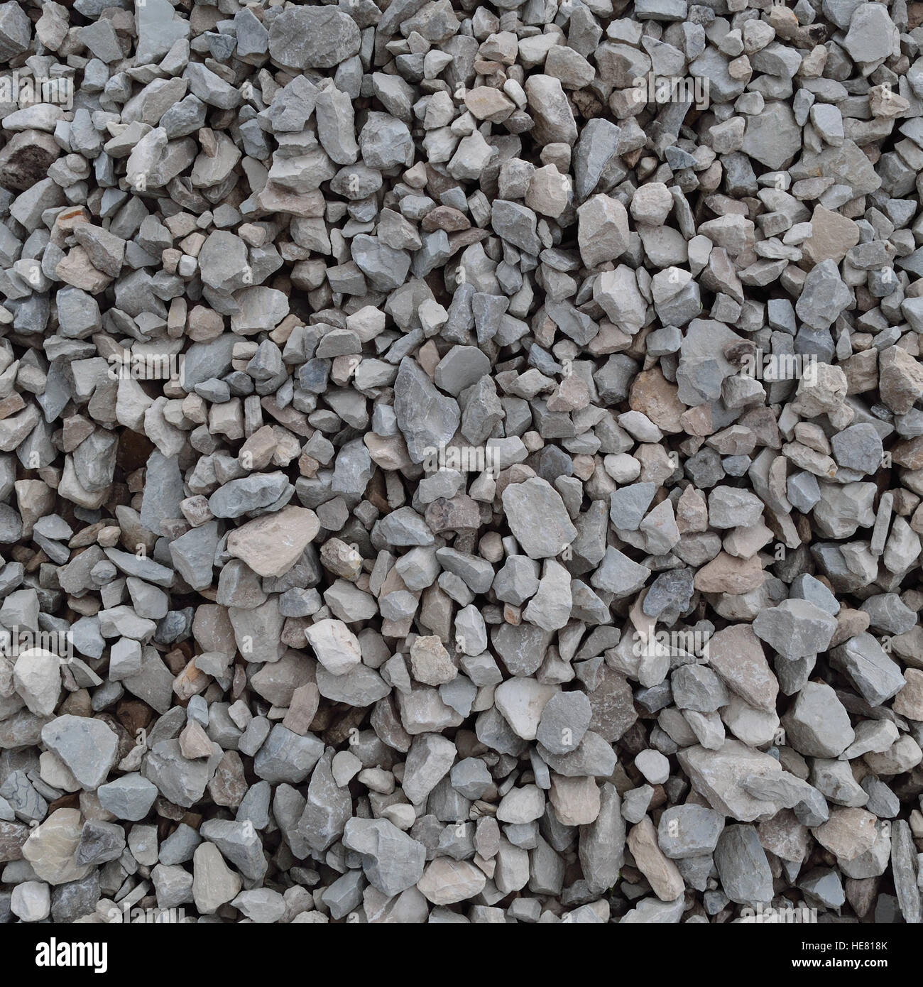 Abstract gray and beige gravel stone background, crushed grey stones ...