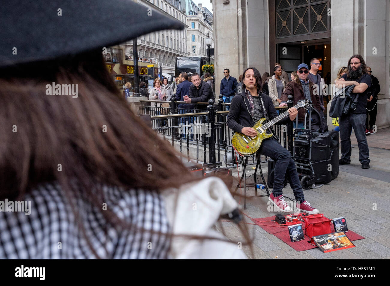 Young man busking hi-res stock photography and images - Alamy