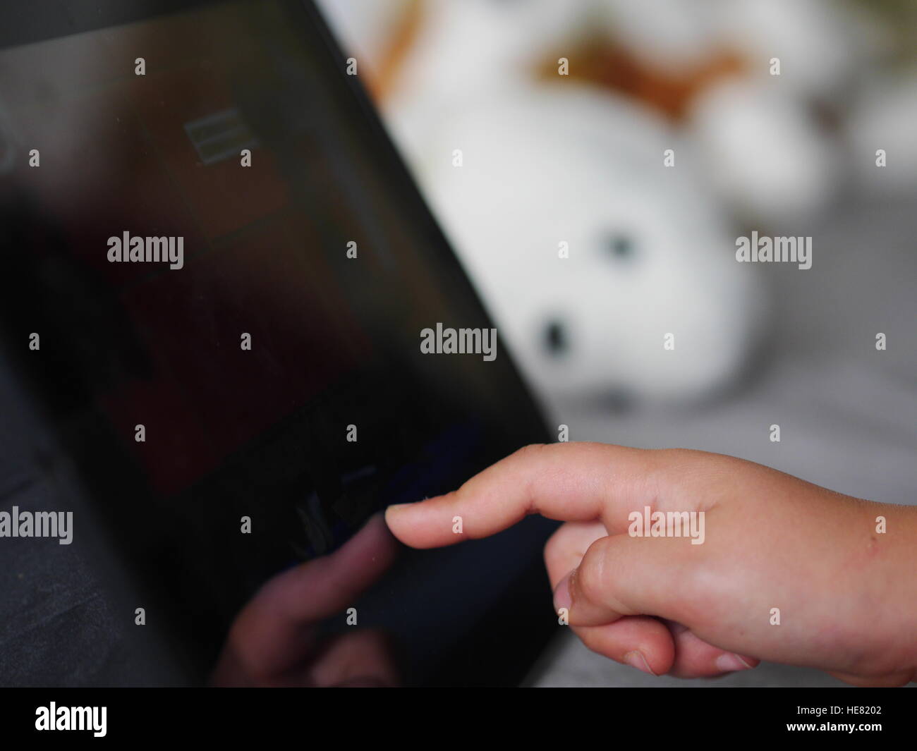 child using tablet computer Stock Photo - Alamy