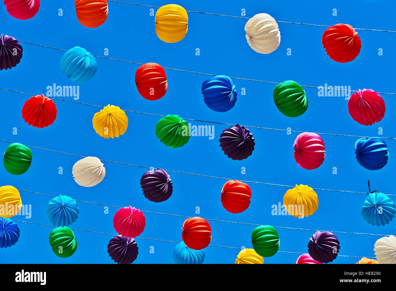 Paper Lanterns on blue sky background at the celebration in Ronda ...